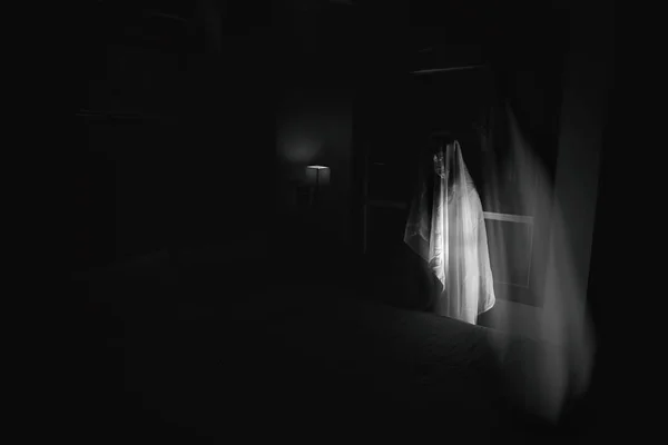 Double exposure of ghost woman in haunted hotel with dark filter ...