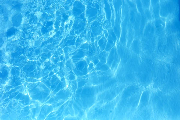 Blue color water in swimming pool rippled water detail backgroun Stock ...
