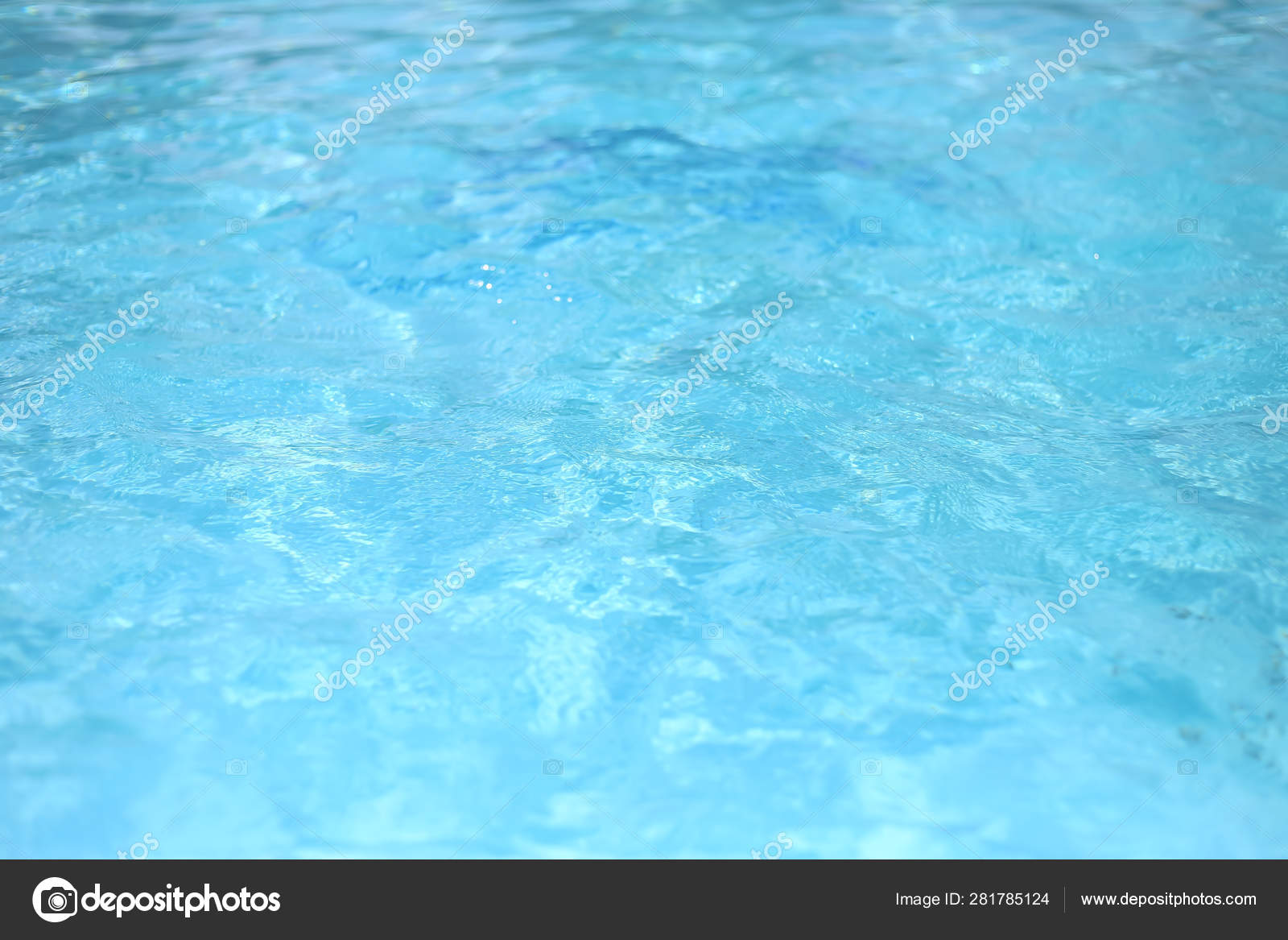 Blue color water in swimming pool rippled water detail backgroun ...