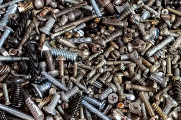 A bunch of screws, different sizes and diameters, with different slots ...