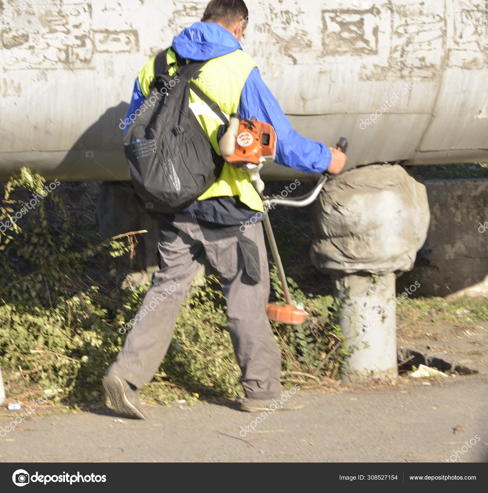 Clean City Worker Engaged Cleaning Territory Mows Grass Stock Photo by ...