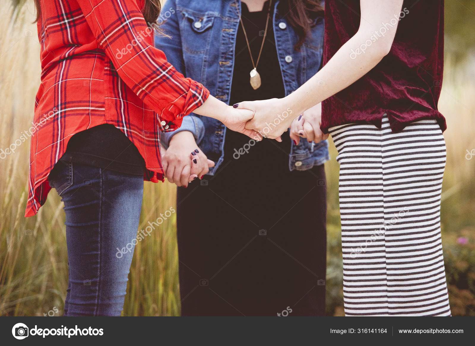 Two Best Friends Holding Hands Wallpaper