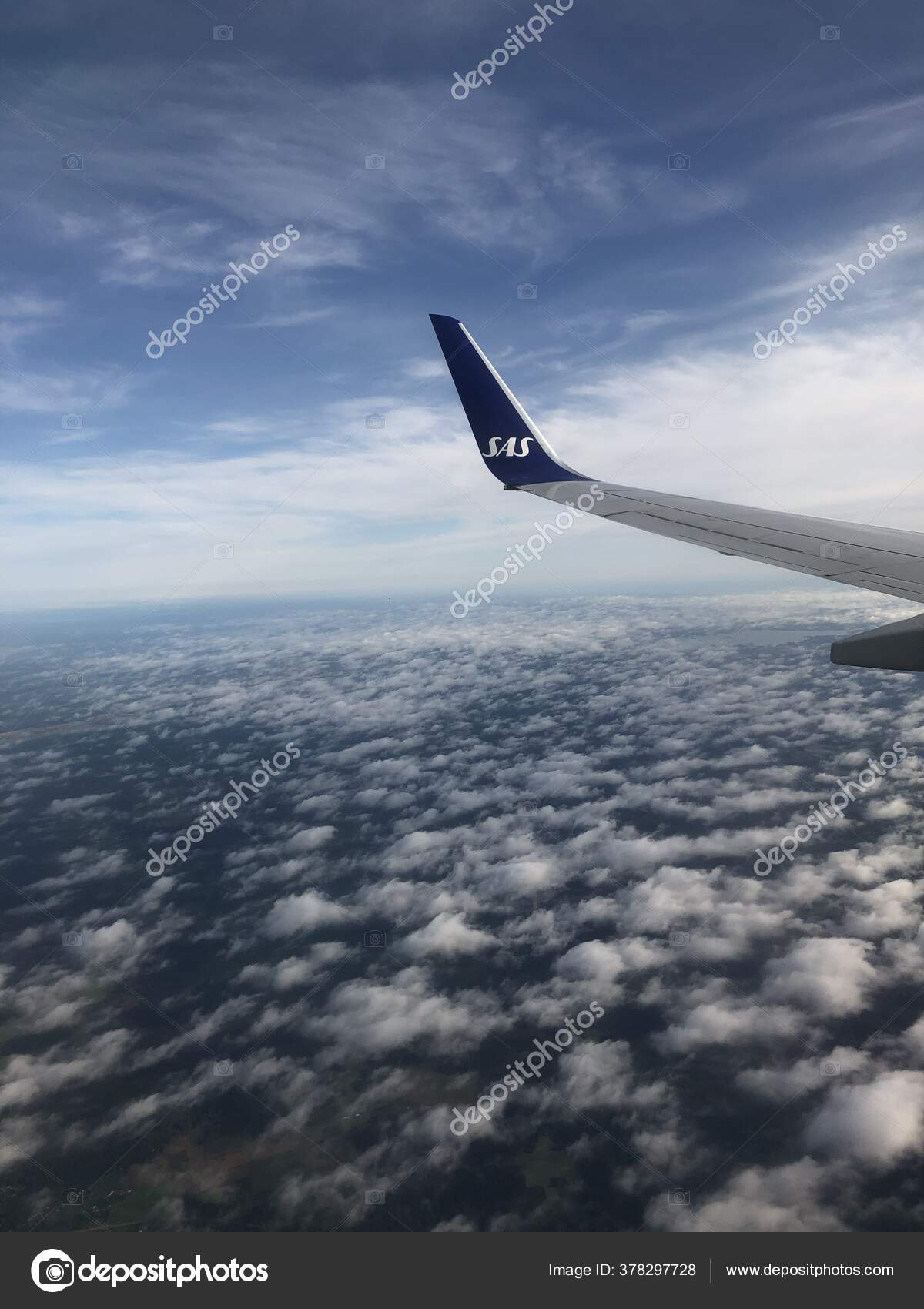 Vertical Shot Clouds Airplane Wing — Stock Photo © Wirestock #378297728
