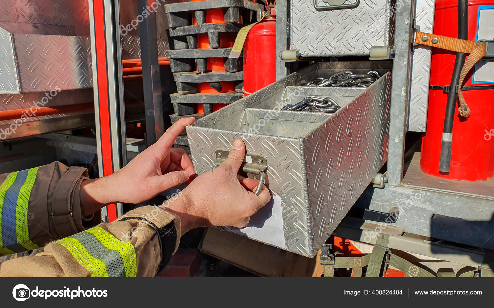 Closeup Caucasian Man Firefighter Opening Drawer Full Chains Firetruck ...