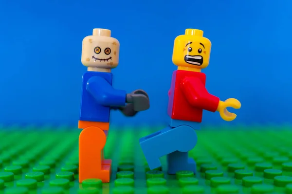 Lego man conflict Stock Photos, Royalty Free Lego man conflict Images ...