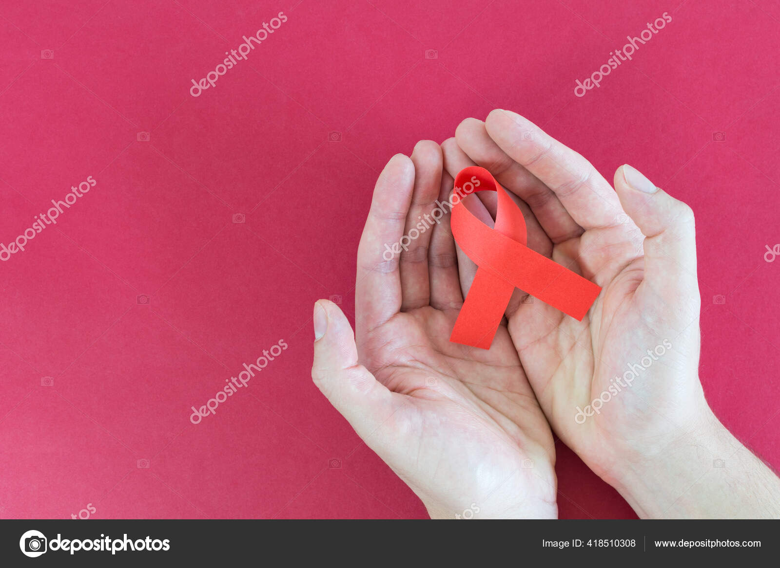 Human Hands Holding World Aids Day Red Ribbon Symbol Red Stock Photo by ©Wirestock 418510308