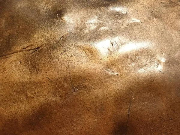 Copper texture background. Bronze texture. Bent metal with dents. Close ...