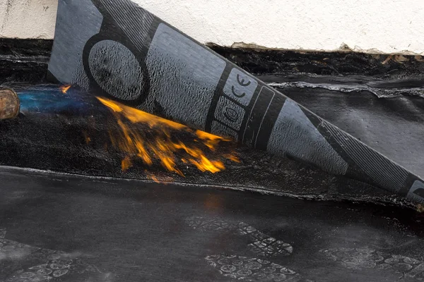 laying of waterproofing sheathing and insulation during the renovation ...