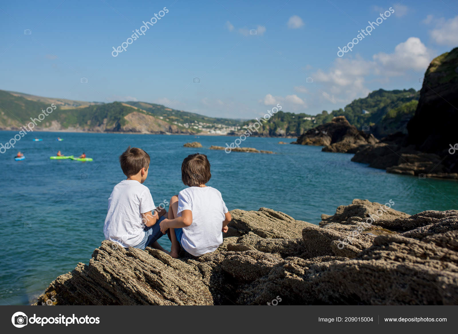 Kids Playing Shore Ocean Rocky Beach Enjoying Splendid View Rocks Stock ...