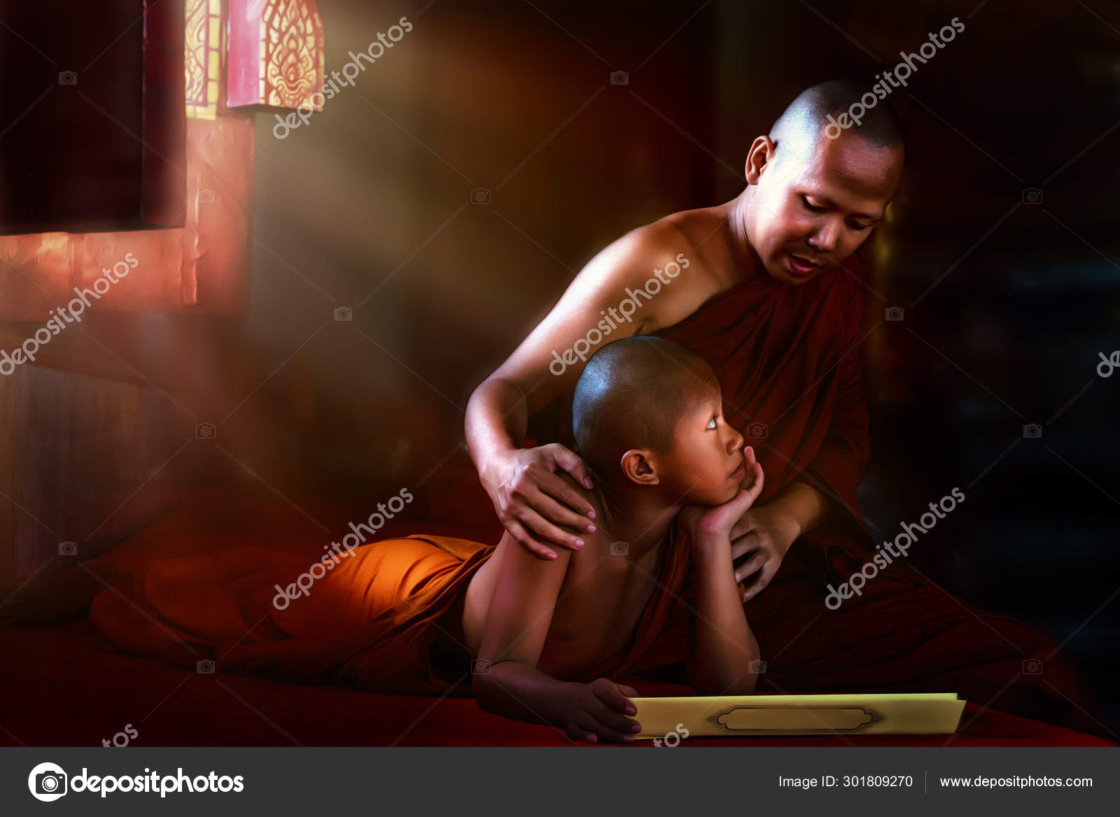 Thai Buddhist monk teaching Buddhist novice Buddhism lessons fro Stock ...