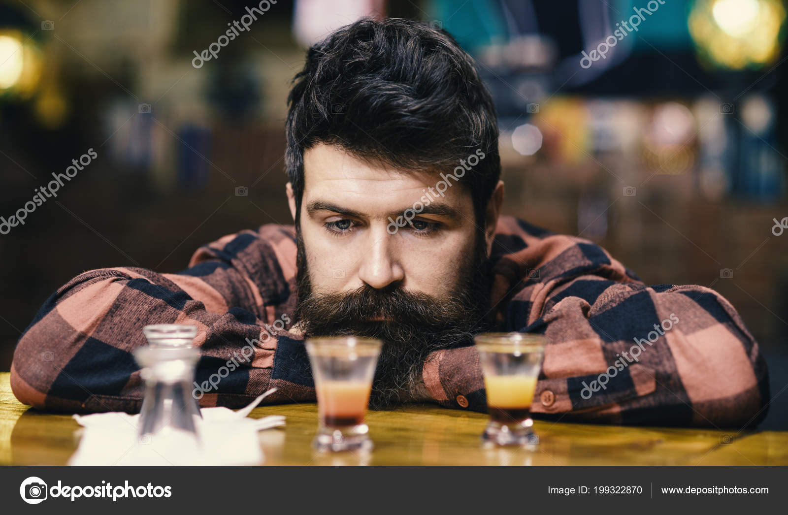 Depressed and sad man sit alone in bar or pub Stock Photo by ©stetsik ...
