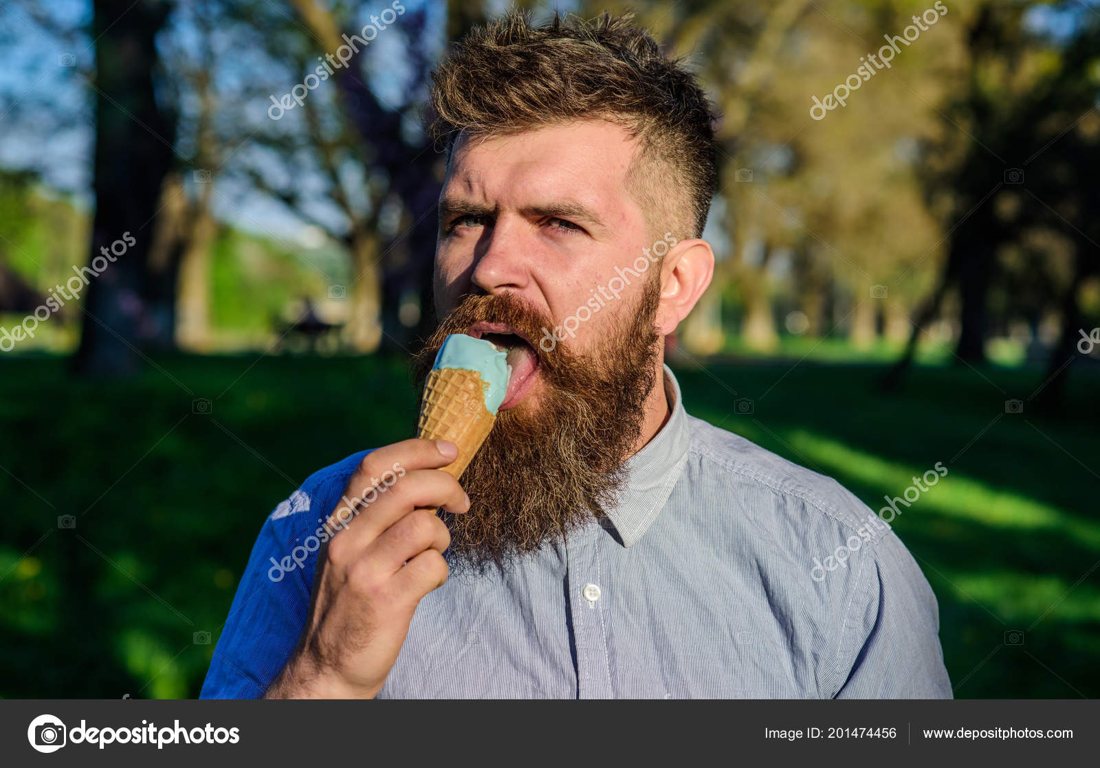 Chilling Concept Man With Long Beard Licks Ice Cream Close Up Man