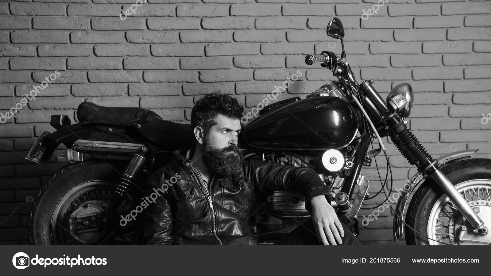 Brutal biker concept. Hipster, brutal biker on pensive face in leather ...