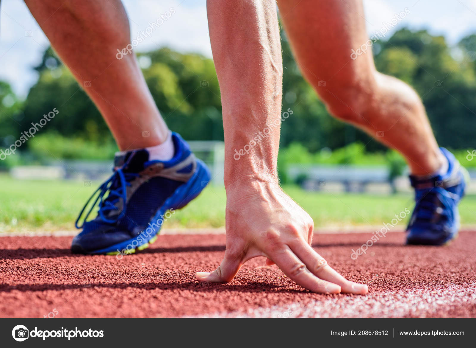 Runner ready to go close up. Ready steady go concept. At beginning of ...