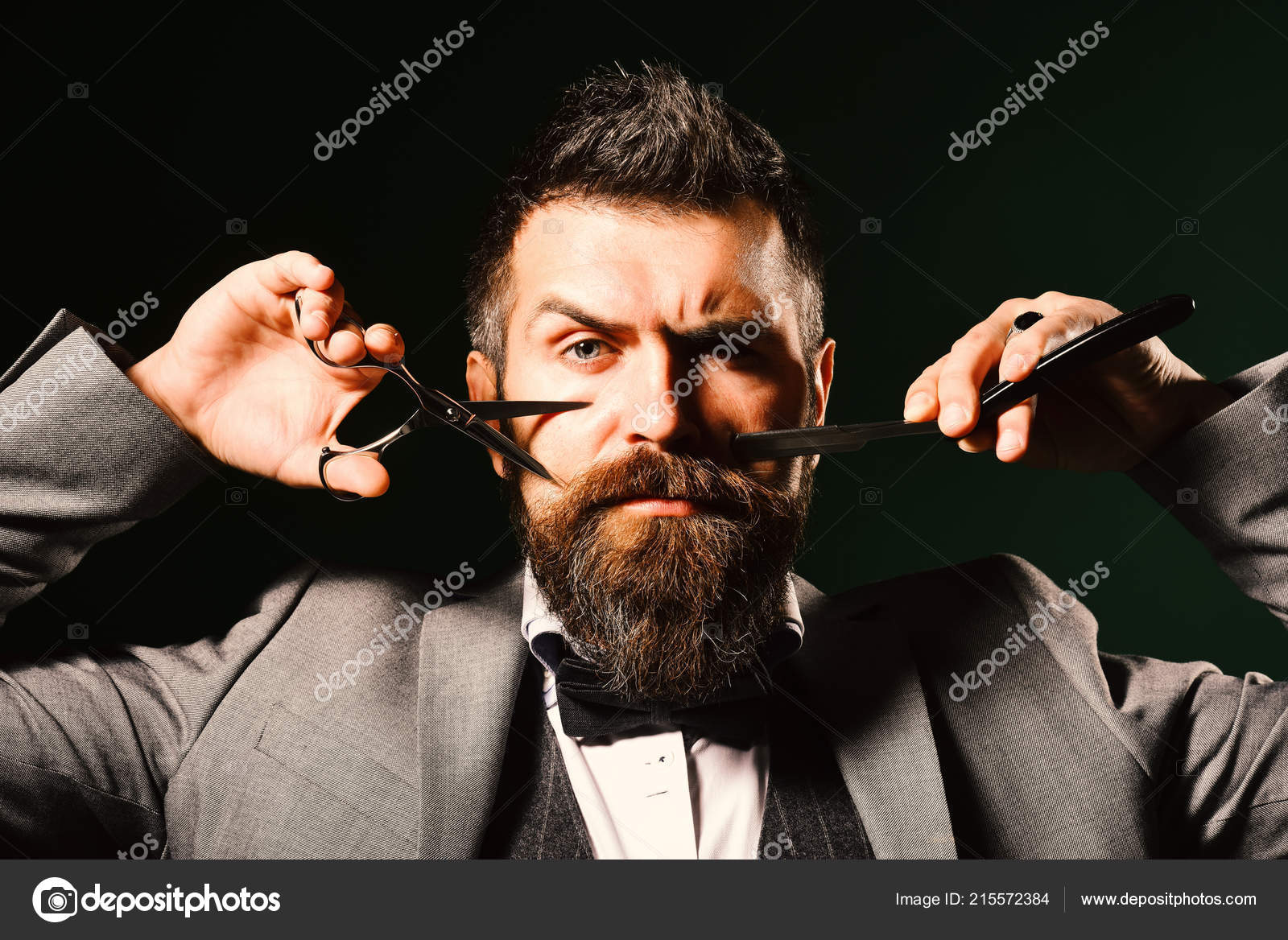 Macho in formal suit cuts and shaves beard and moustache — Stock Photo ...
