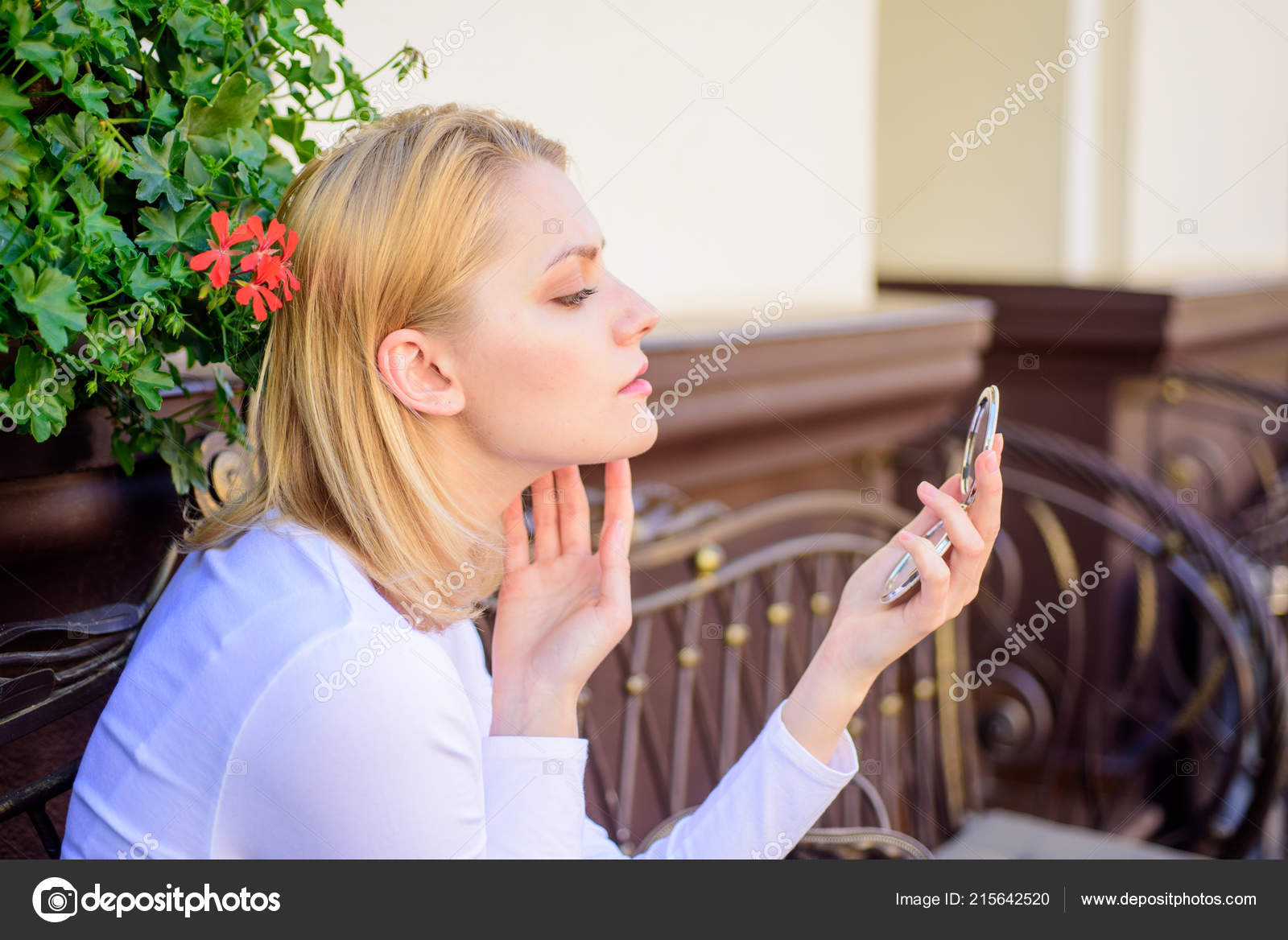 Girl looking in mirror check her appearance. Girlish secrets concept ...