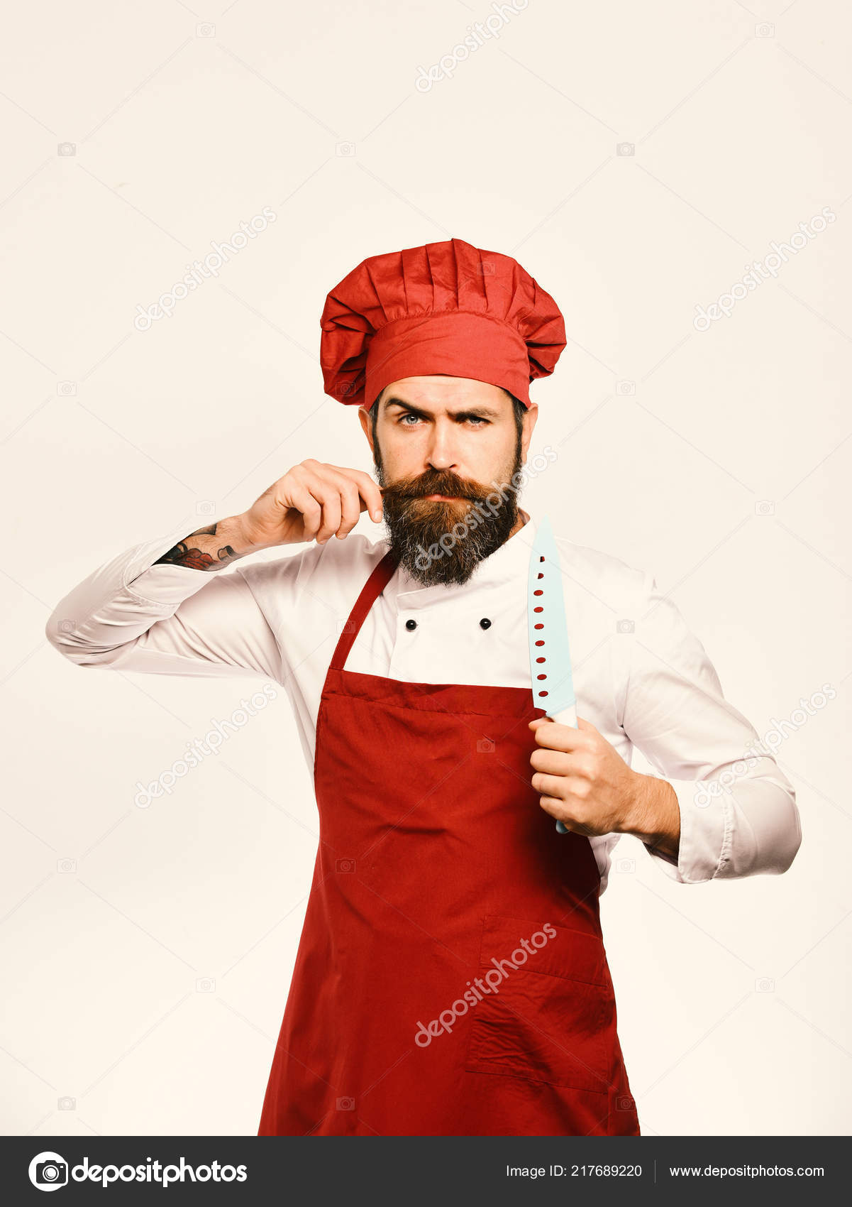 Chef cook against white background touching moustache — Stock Photo ...