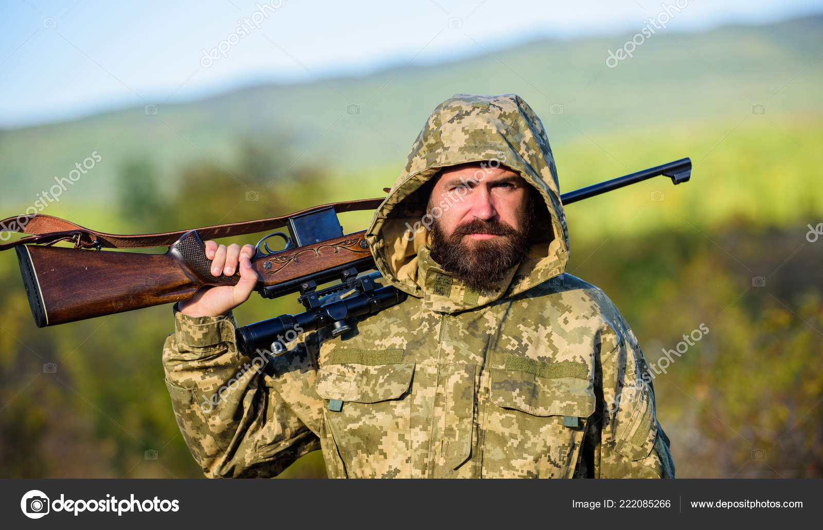Guy hunting nature environment. Bearded hunter rifle nature background ...