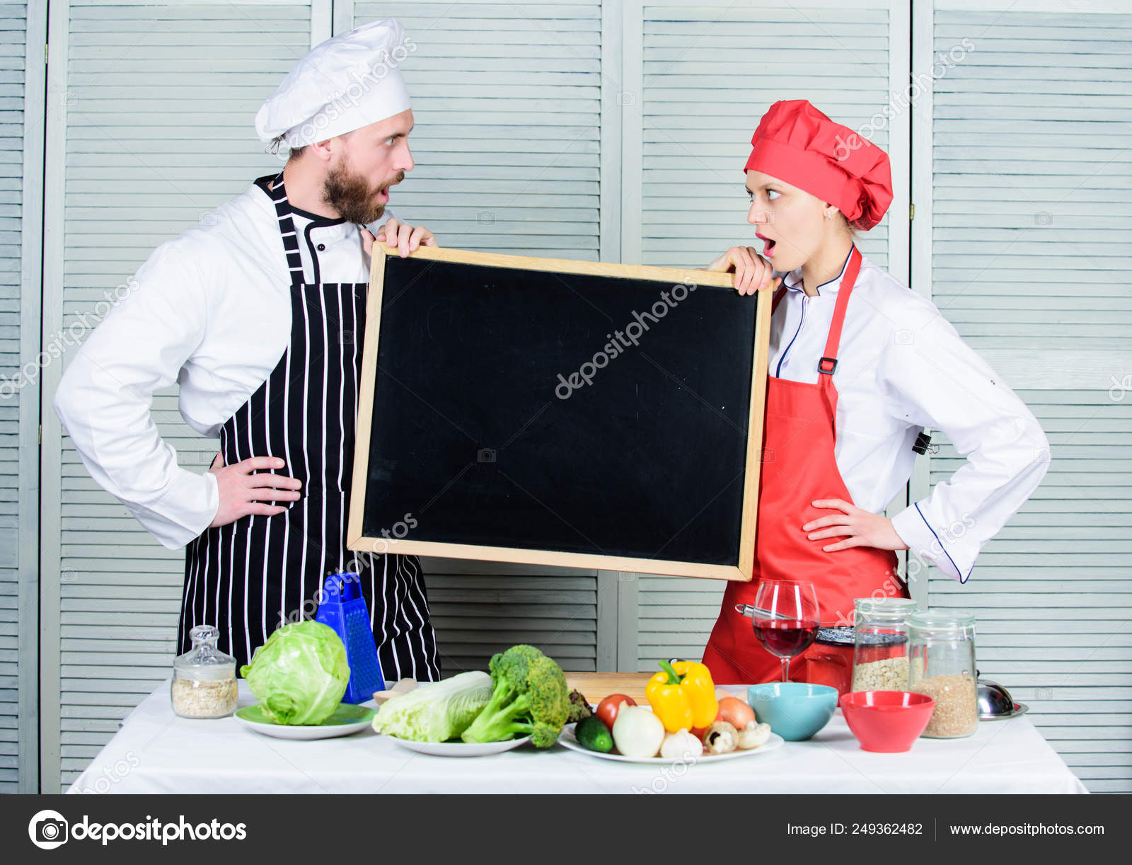 Gaining a range of skills. Couple of man and woman holding empty ...