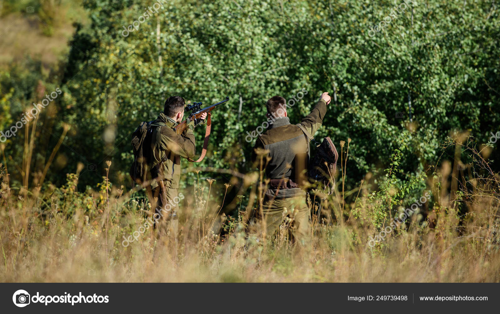 Hunters friends enjoy leisure. Teamwork and support. Activity for real ...
