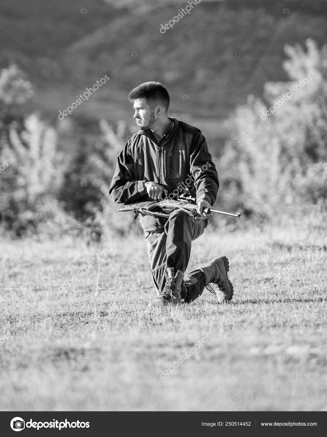 Hunting shooting trophy. Hunter with rifle looking for animal. Man ...