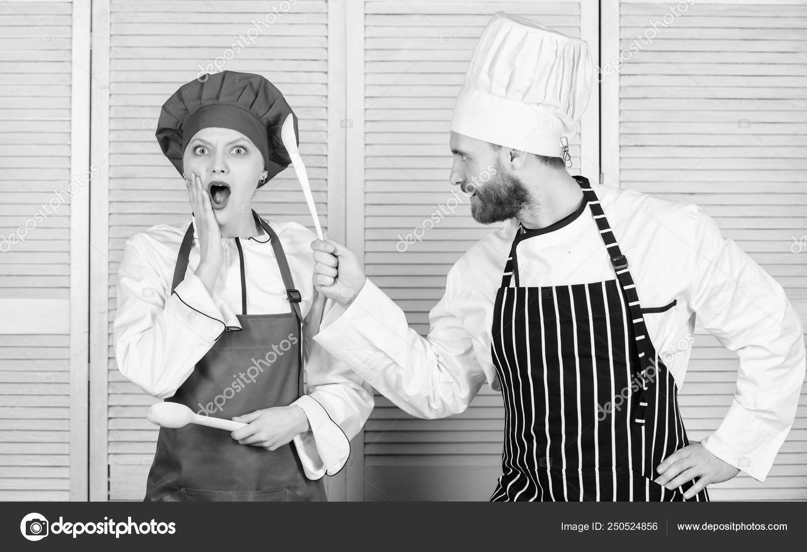 Couple compete in culinary arts. Kitchen rules. Culinary battle concept ...