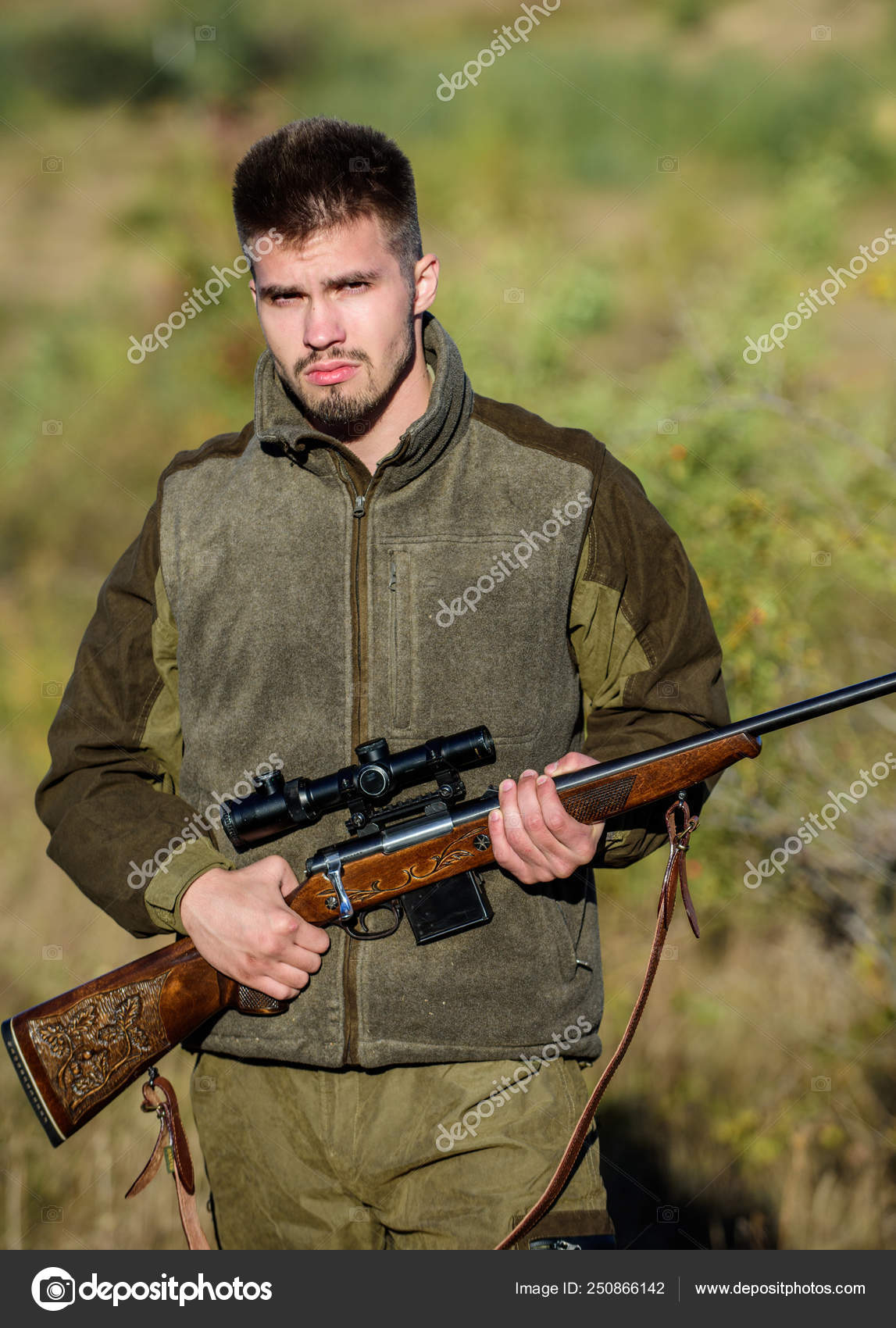 Bearded serious hunter spend leisure hunting. Man brutal unshaved ...