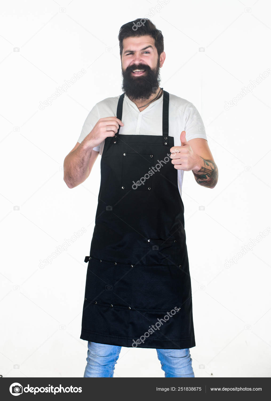 Recommending his approval. Bearded man giving thumbs up approval hand ...