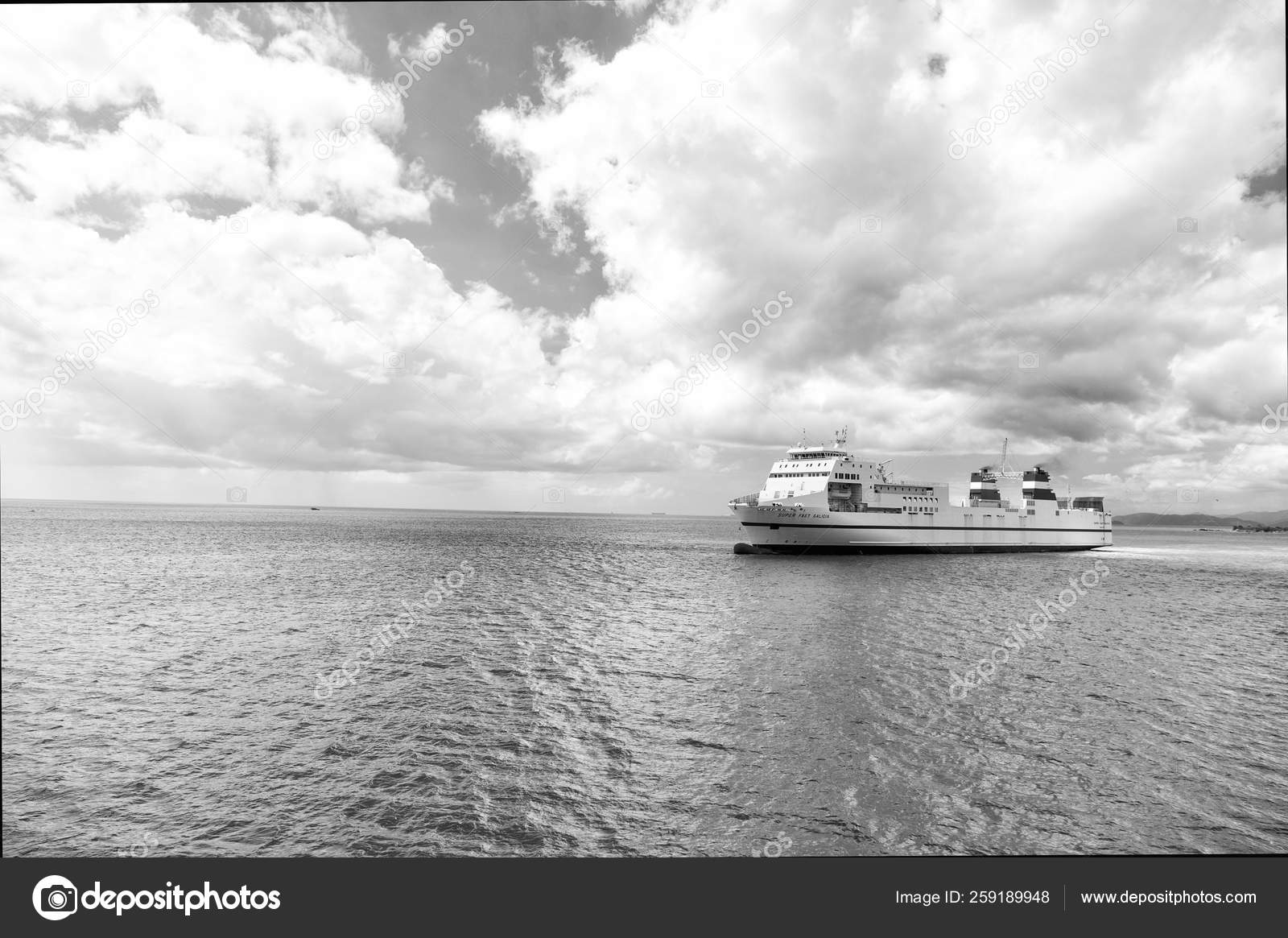 Modern ship in blue sea — Stock Editorial Photo © stetsik #259189948