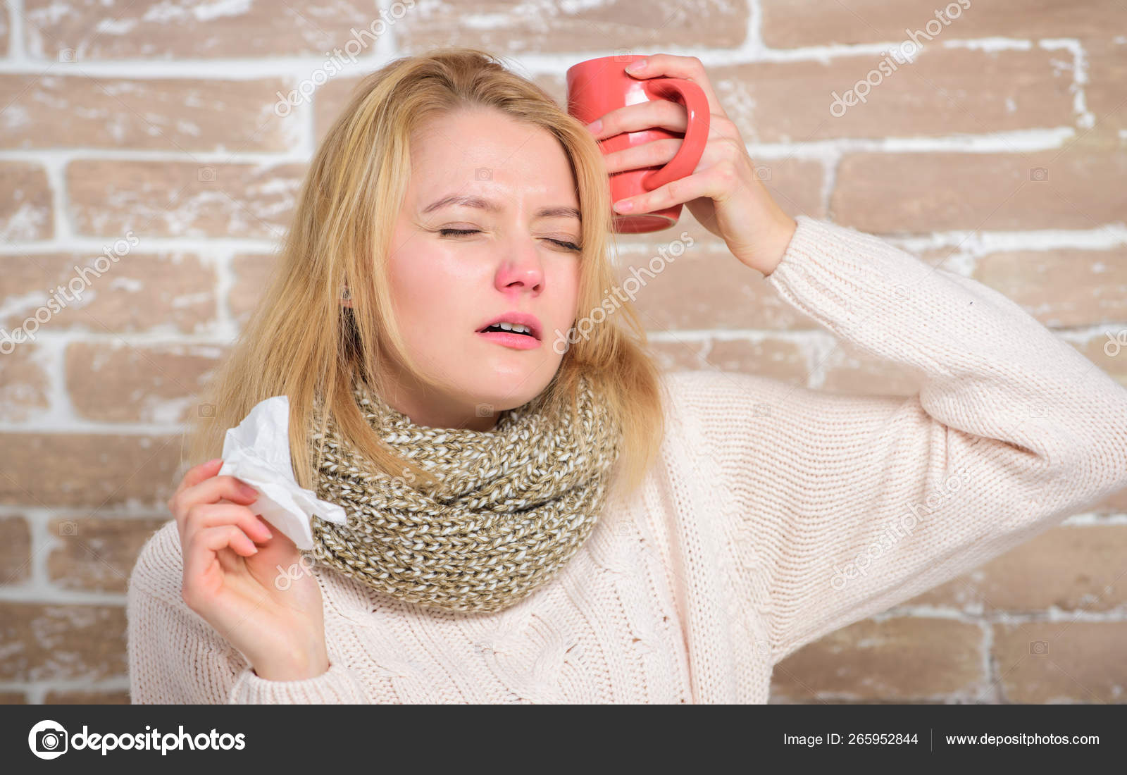 Drink more liquid get rid of cold. Girl hold tea mug and tissue. Runny ...
