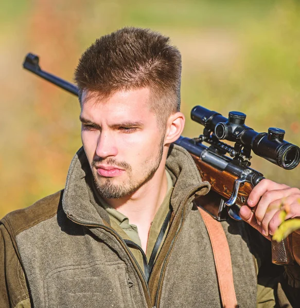 Man hunter with rifle gun. Boot camp. Hunting skills and weapon ...