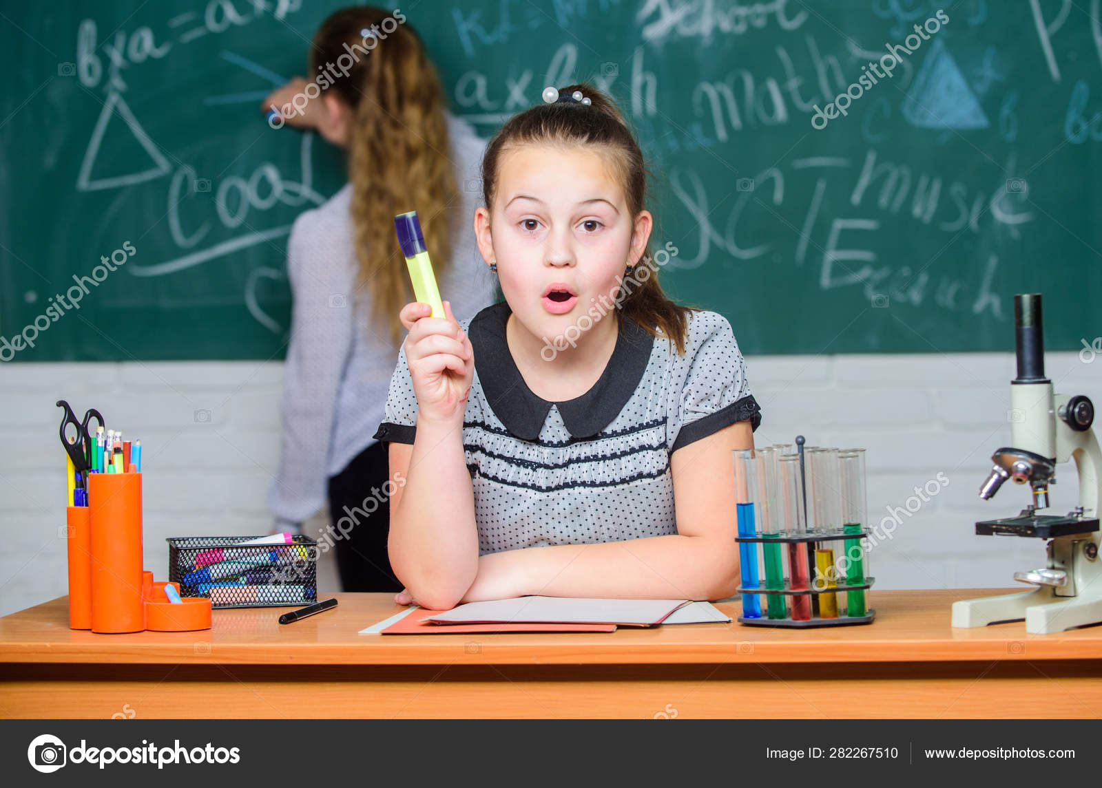 Girls classmates study chemistry. Microscope test tubes chemical ...