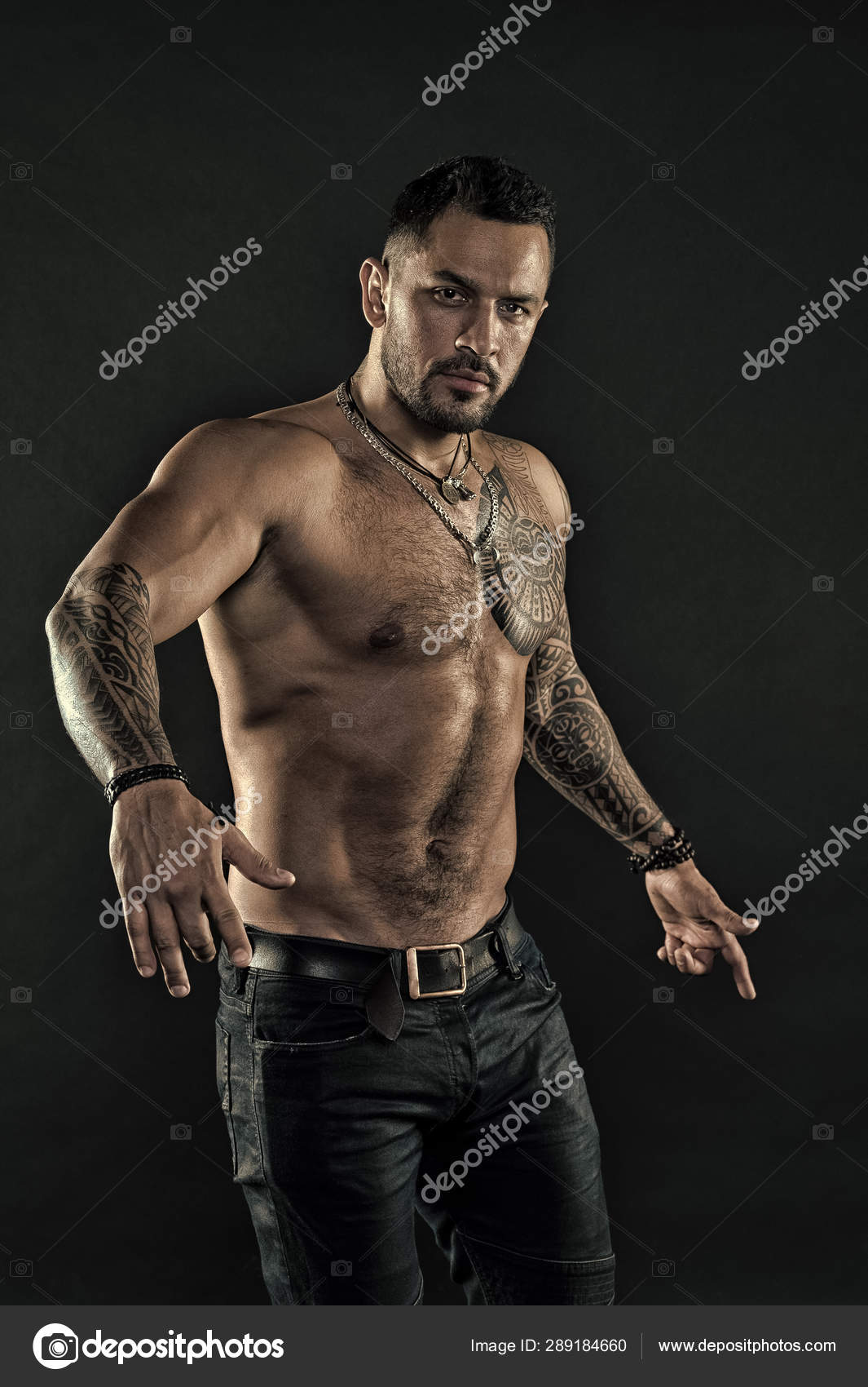 Brutal strict macho with tattoos. Masculinity and brutality. Tattoo ...