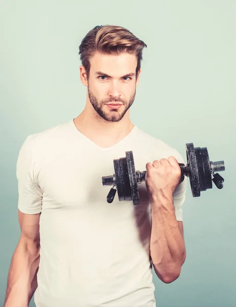 mens power. man lifting barbell. sportsman training in gym. Sport dumbbell equipment. Athletic ...