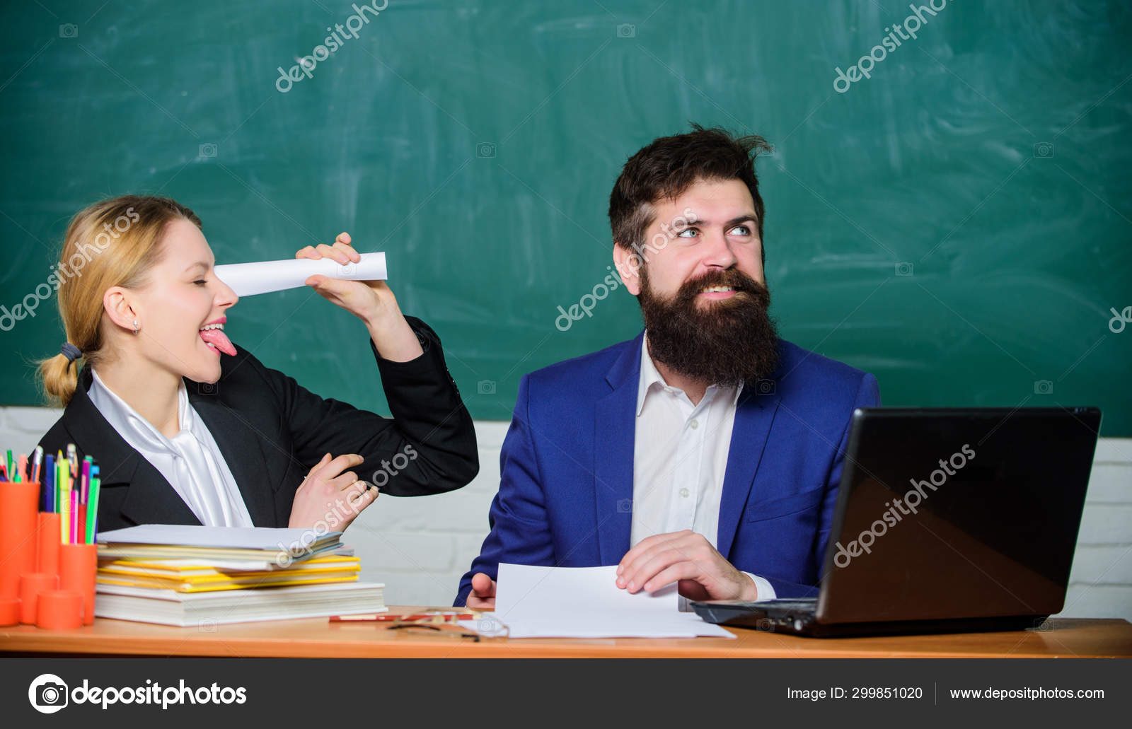 Professional differences. Teacher and supervisor working in school ...