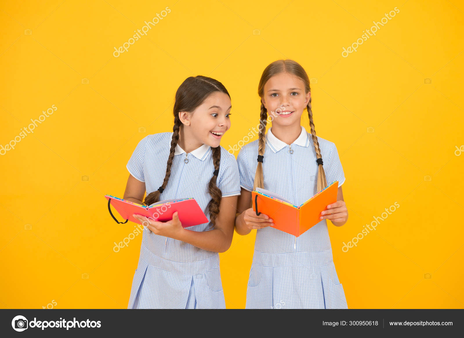 Reading and retelling. Small children holding books yellow background ...