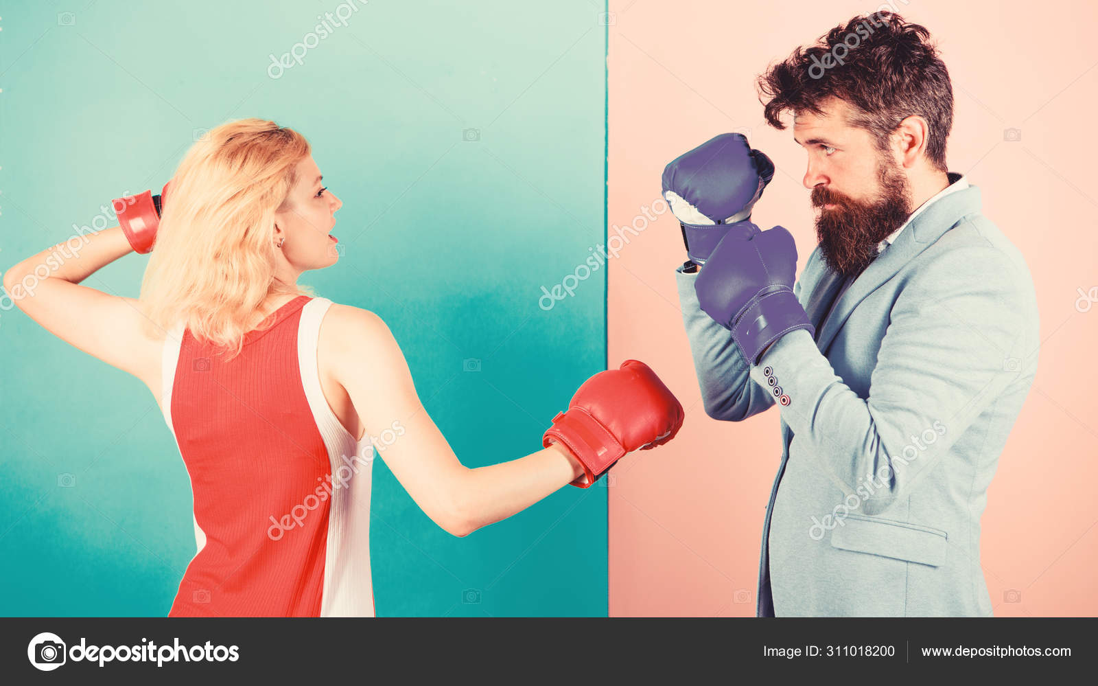 Gender equality. Man formal suit and athletic woman boxing fight ...