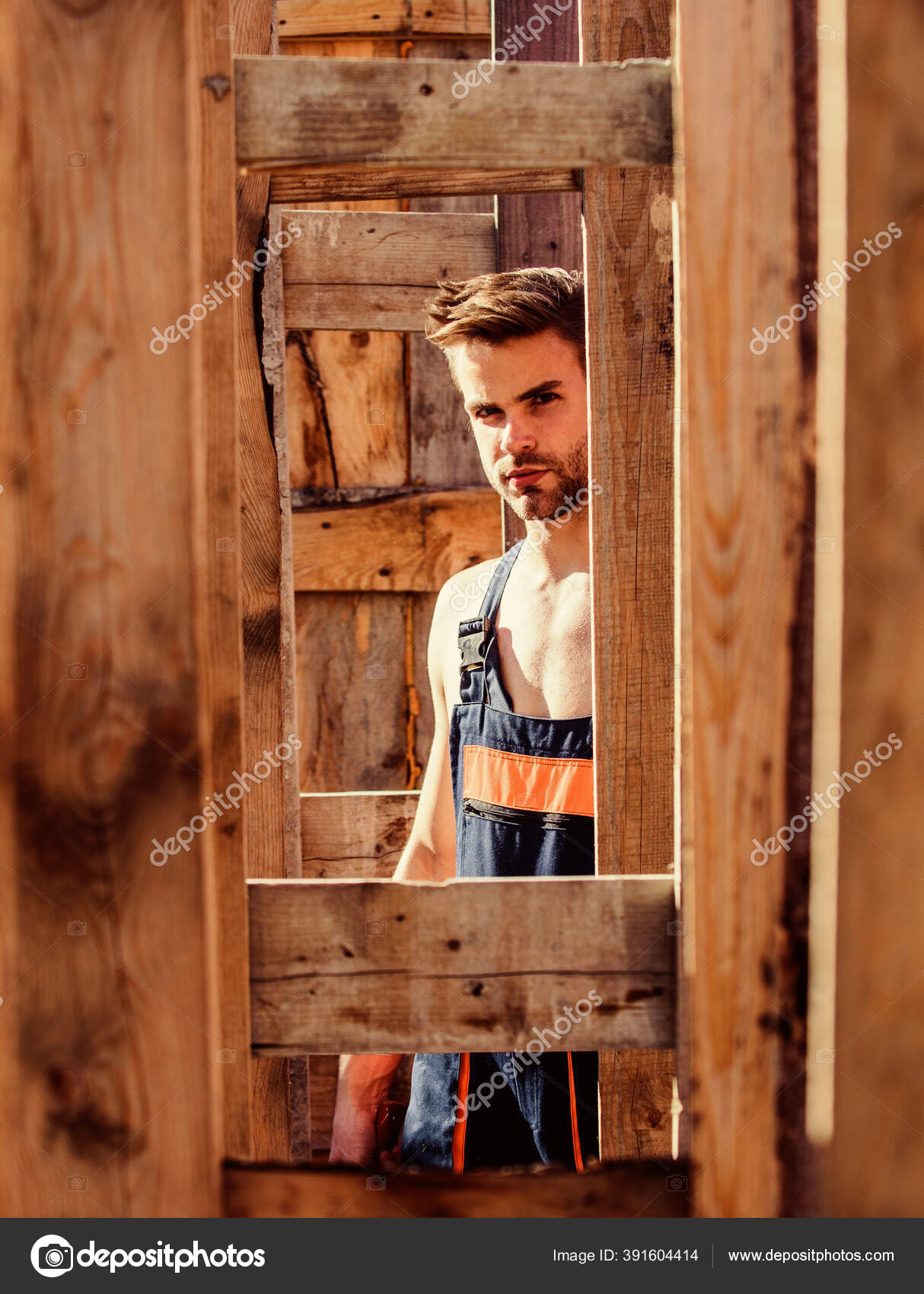 Scaffolding and frameworks. Planning construction. Man builder in work ...