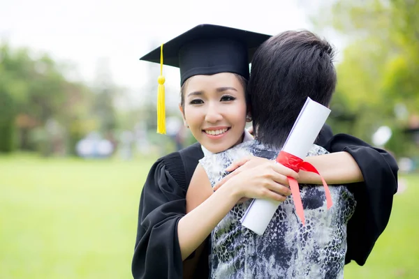 Graduate student hugging Stock Photos, Royalty Free Graduate student ...