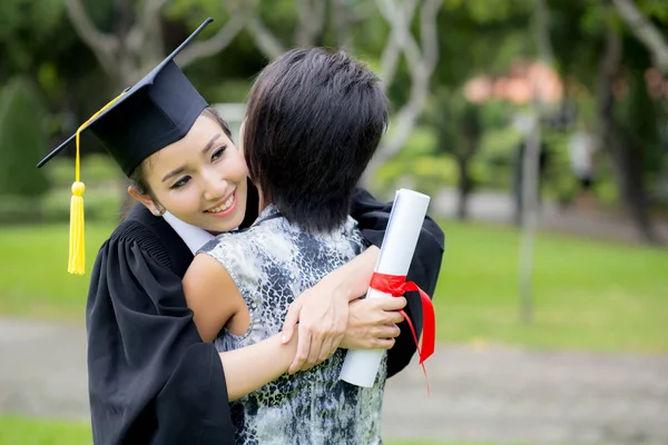 Graduate student hugging Stock Photos, Royalty Free Graduate student ...