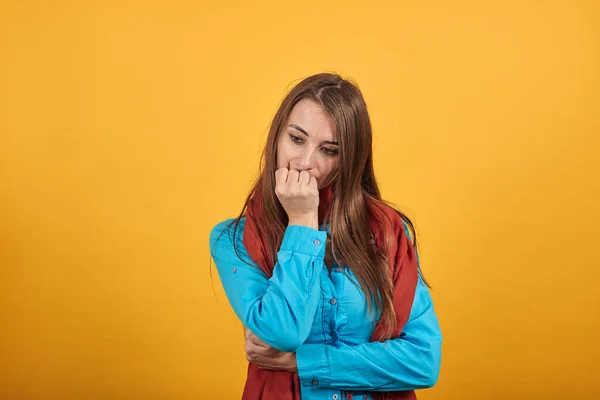 Scared, biting fists emotionally. Covering mouth behind knuckle. Fear ...