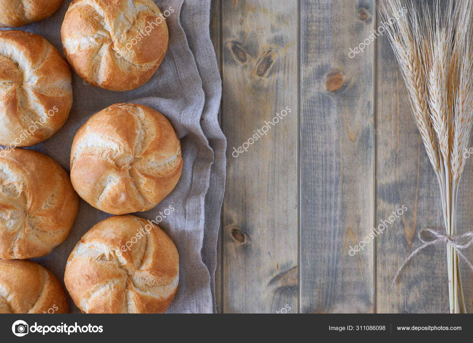Crusty round bread rolls, known as Kaiser or Vienna rolls on lin Stock ...