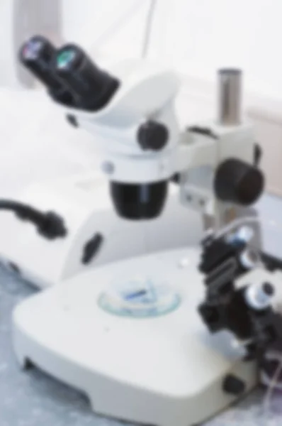 Microscope and test tubes in laboratory — Stock Photo © AndreyBezuglov ...