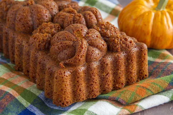 Home baked loaf of pumpkin bread baked in decorative fall themed pan ...