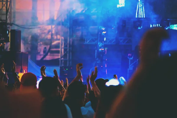 Group of people having fun at music concert - Stock Image - Everypixel