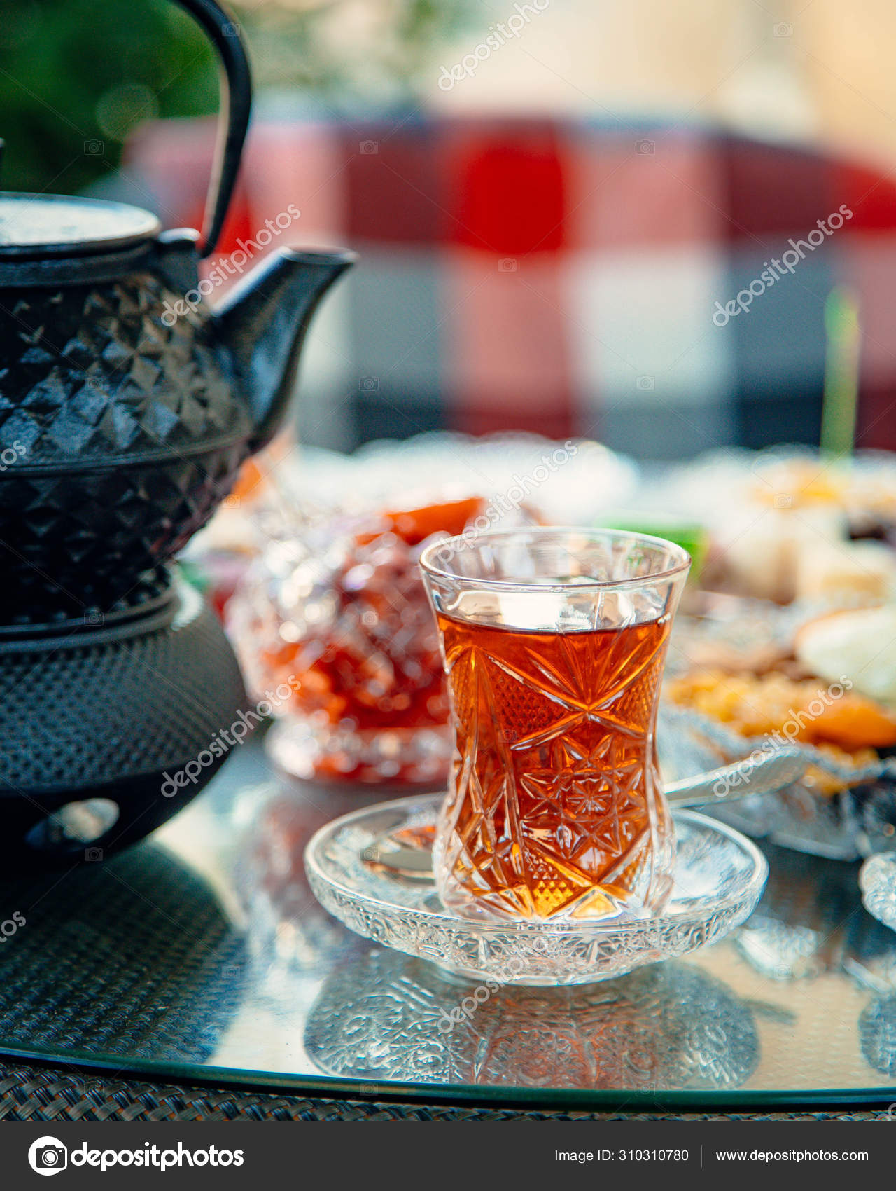 Black tea in an armudu glass Stock Photo by ©kamranaydinov 310310780
