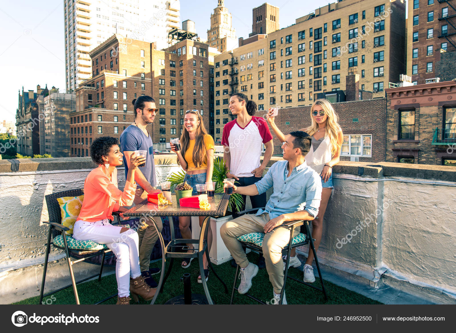 Young Happy People Having Barbecue Dinner Rooftop New York Group ...