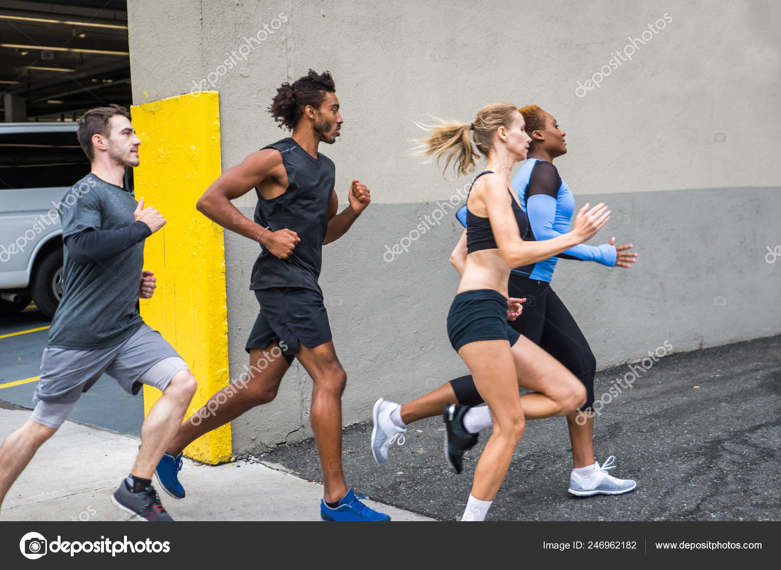 Multi Ethnic Group Runners Training Outdoors Sportive People Running ...