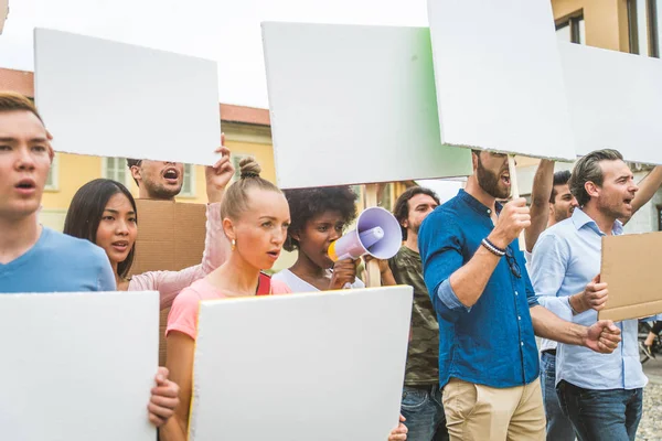 Activists demonstrating against social issues - Stock Image - Everypixel