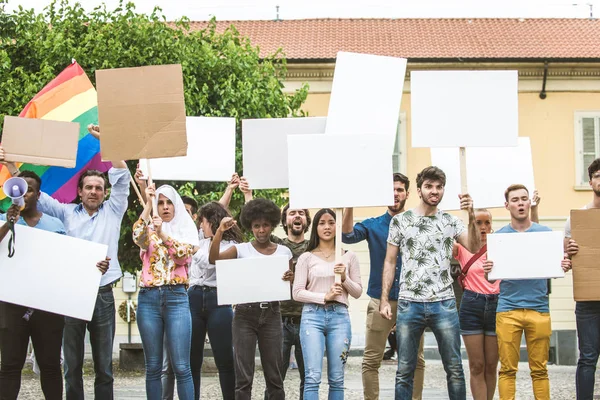 Activists demonstrating against social issues - Stock Image - Everypixel
